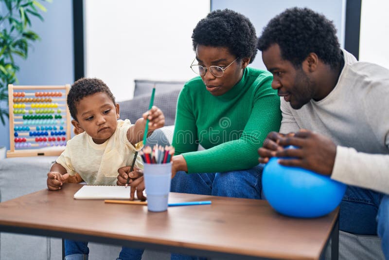 African American Family Drawing on Notebook at Home Stock Image - Image ...