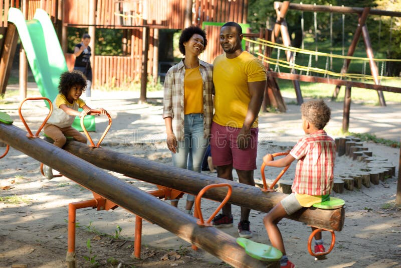 African Family Having Fun Outdoors Stock Photo - Image of american ...