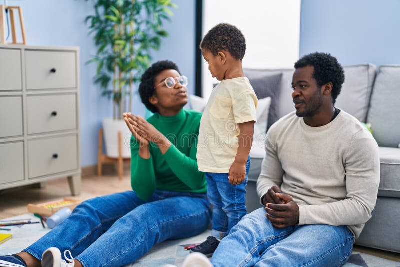 African American Family Speaking at Home Stock Photo - Image of person ...