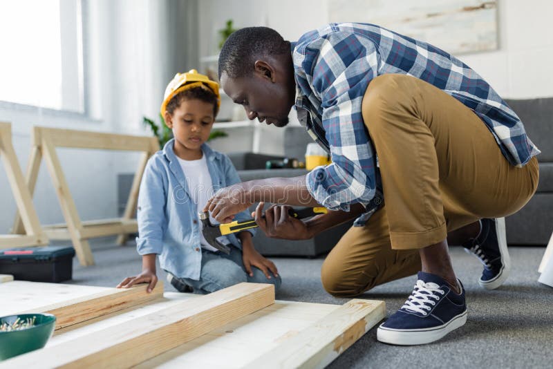 African-american Father Showing Hammer Stock Image - Image of father ...