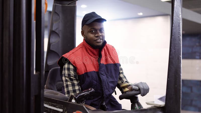 African American Forklift Operator in the Warehouse Stock Footage ...