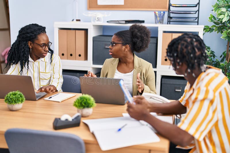 African American Friends Business Workers Sitting on Table Working at ...