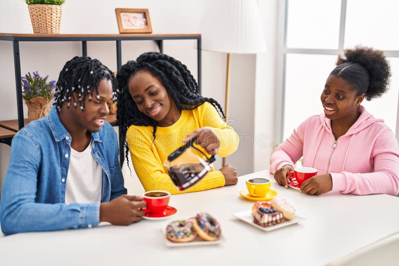 African American Friends Having Breakfast Sitting on Table at Home ...