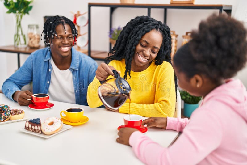 African American Friends Having Breakfast Sitting on Table at Home ...