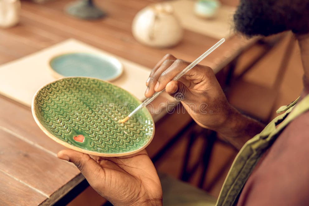 African American Guy Working with Pottery in His Workshop Stock Image ...