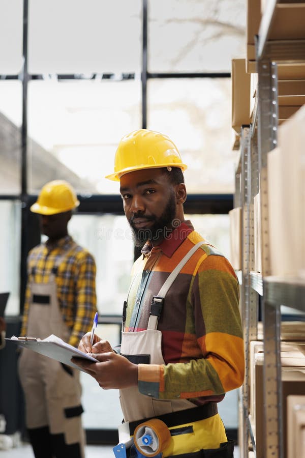 African American Logistics Supervisor Doing Merchandise Inventory in ...