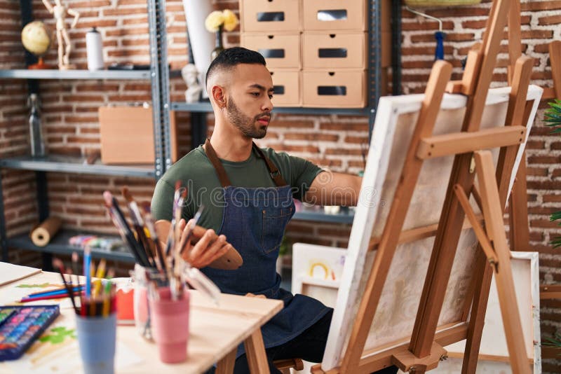 African American Man Artist Drawing with Doubt Expression at Art Studio ...
