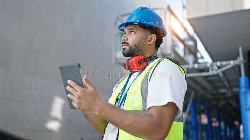 African American Man Builder Using Touchpad at Street Stock Image ...