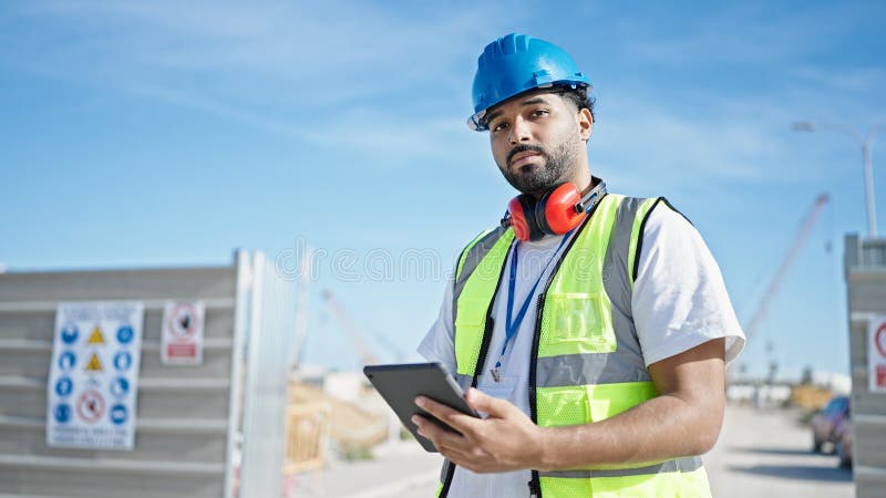 African American Man Builder Using Touchpad at Street Stock Image ...