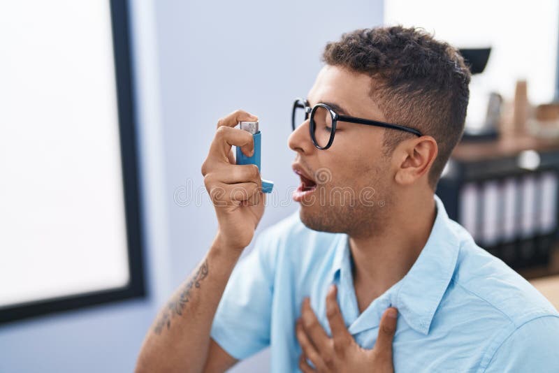 African American Man Business Worker Using Inhaler at Office Stock ...