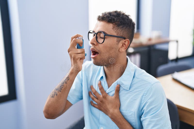 African American Man Business Worker Using Inhaler at Office Stock ...