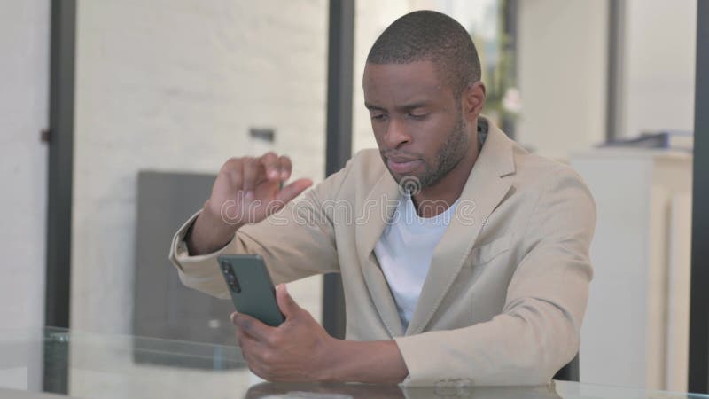 African American Man Busy Using Smartphone Stock Video - Video of ...