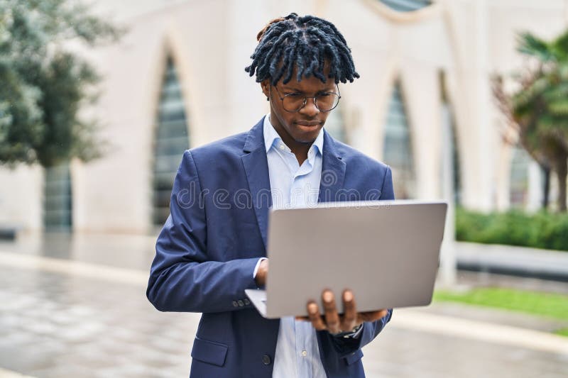 African American Man Executive Using Laptop at Street Stock Image ...