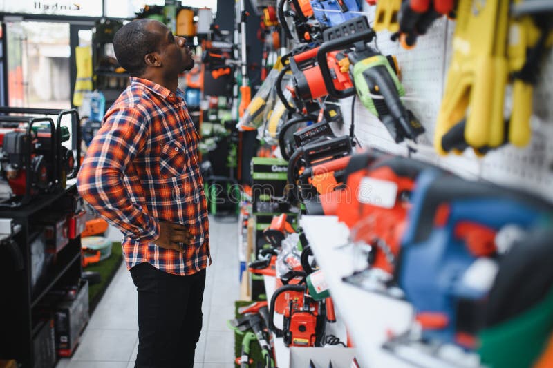 African American Man in a Hardware Store Stock Image - Image of ...