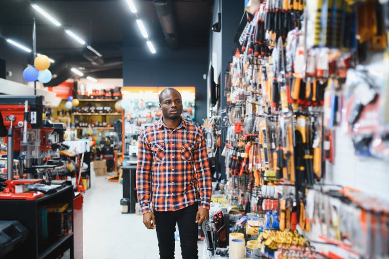 African American Man in a Hardware Store Stock Photo - Image of buyer ...