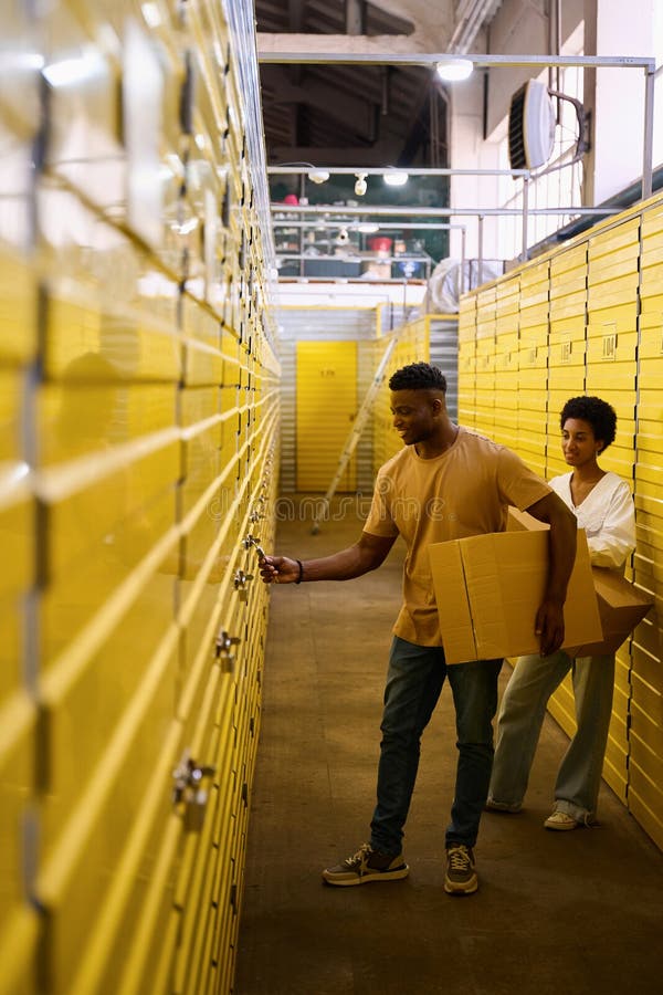 African American Man Opens a Storage Unit Stock Image - Image of ...