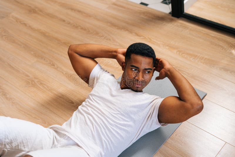 African-American Man Practicing Abs Crunches, Training Abdominal ...