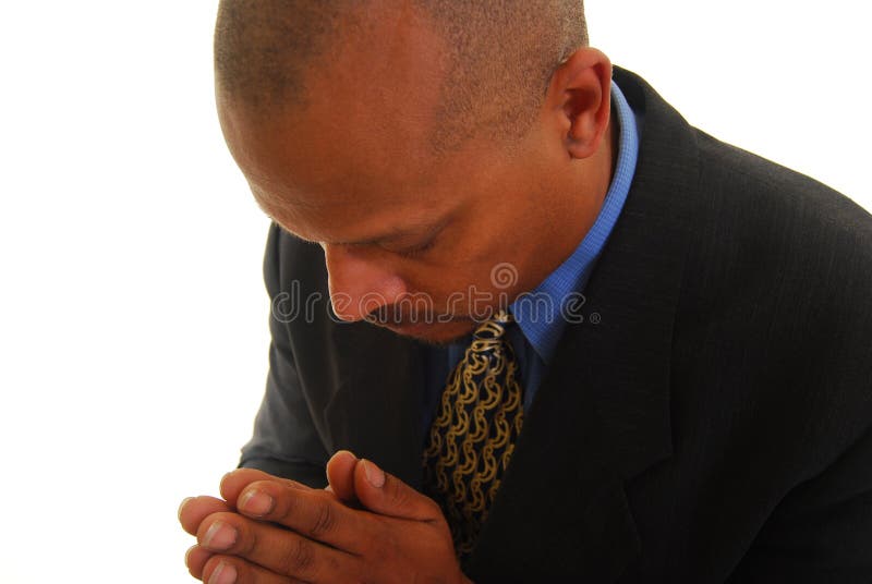 Black Man In Suit Praying