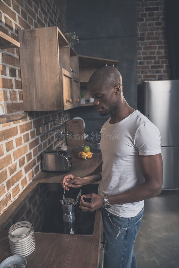 African American Man Preparing Morning Coffee for Breakfast Stock Photo ...
