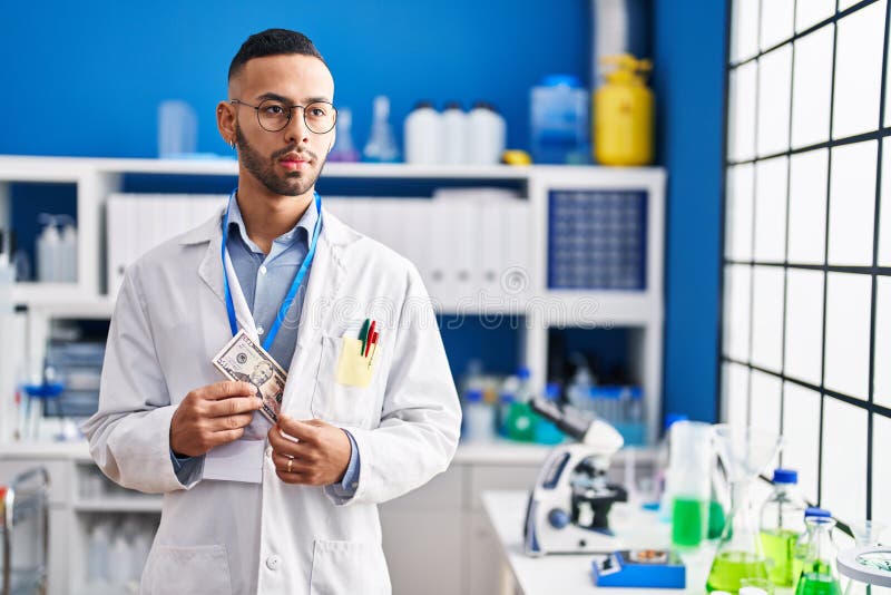 African American Man Scientist Holding Dollar at Laboratory Stock Image ...