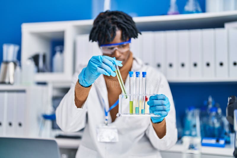 African American Man Scientist Holding Test Tubes at Laboratory Stock ...