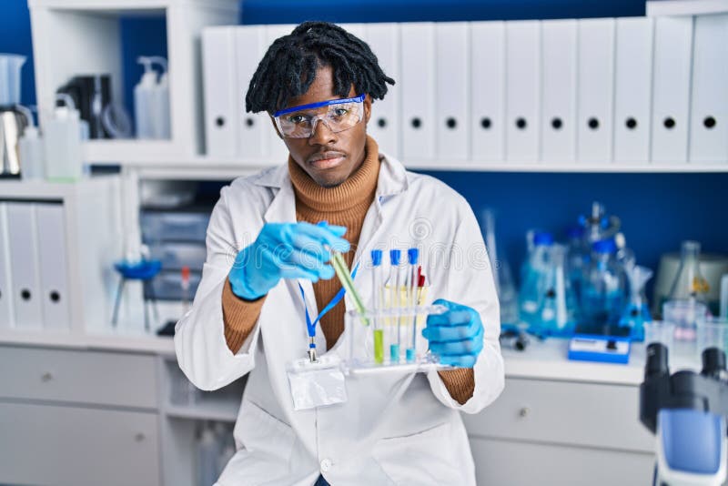 African American Man Scientist Holding Test Tubes at Laboratory Stock ...