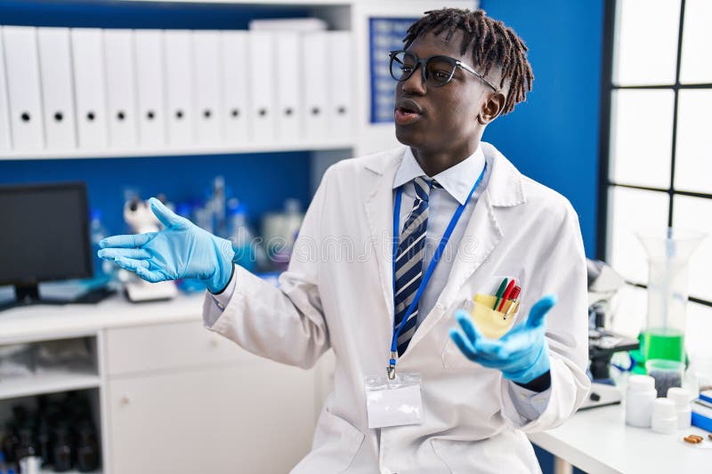 African American Man Scientist Speaking at Laboratory Stock Photo ...