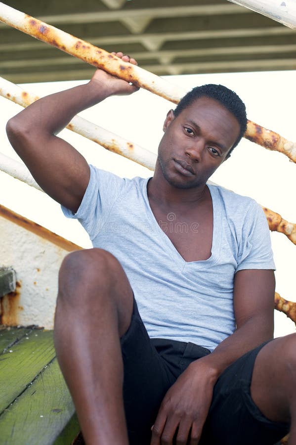 African American Man Sitting Outdoors Stock Photo - Image of person ...