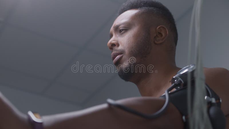 Female Doctor Puts Sensors for Holter Monitoring on African American ... Female Doctor Puts Sensors for Holter Monitoring on African American ...
