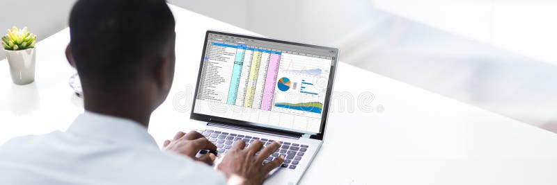 African American Man Using Spreadsheet Reports Stock Photo - Image of ...