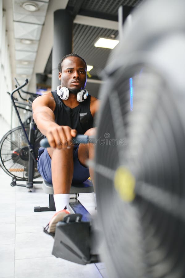 African American Man Working Out in the Gym. Stock Photo - Image of ...