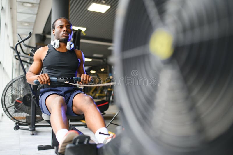 African American Man Working Out in the Gym. Stock Photo - Image of ...