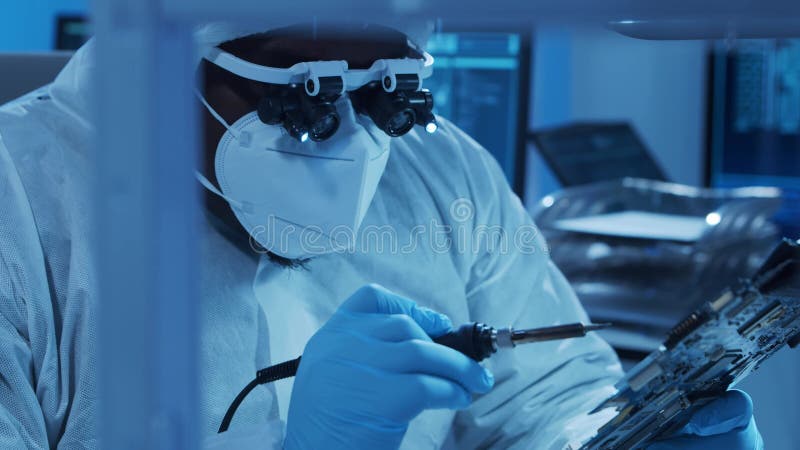 African-american Microelectronics Engineer Works in a Modern Scientific ...