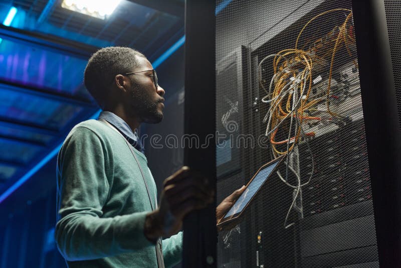 African American IT Specialist In Server Room Stock Photo - Image of ...