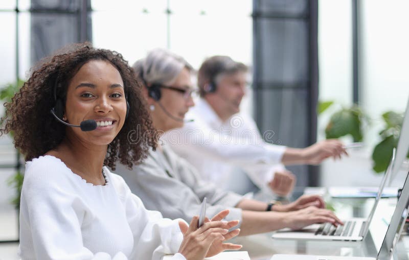 African American Operator Smiling in a Call Center Stock Photo - Image ...