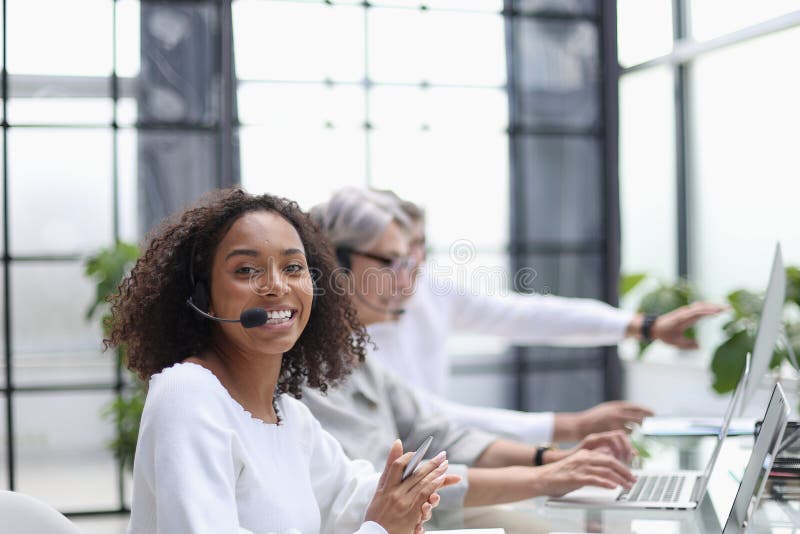 African American Operator Smiling in a Call Center Stock Photo - Image ...