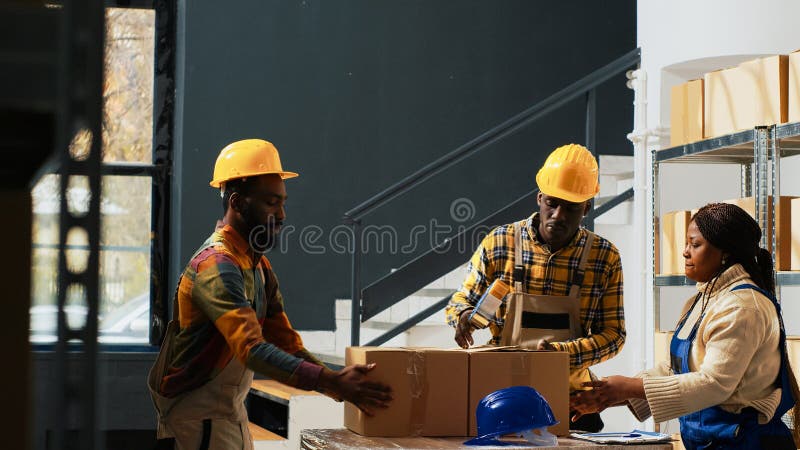 African American People Packing Boxes with Products Stock Image - Image ...