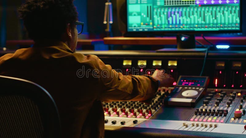 African American Music Producer Recording Tracks and Editing Them Stock ...