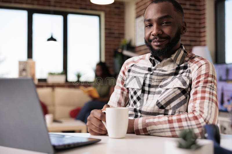 African American Programmer Posing Confident Looking at Camera Holding ...