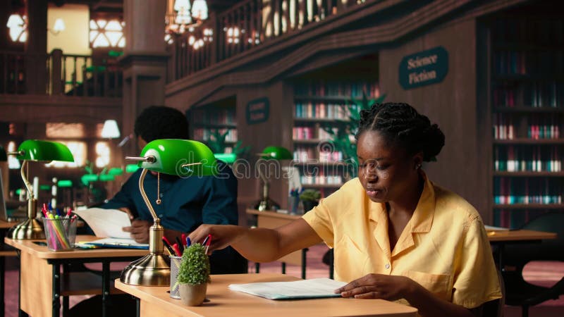 African American Pupil Highlighting Key Words from the Class Notes ...