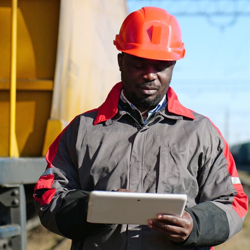 African American Railway Man with Tablet Computer at Freight Train ...