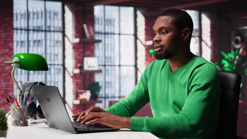 African American Remote Worker Solving His daily Freelancing Tasks on ...