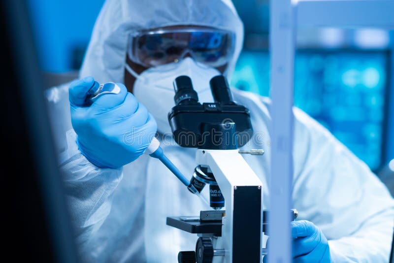 African-american Scientist Works in a Scientific Lab Using Laboratory ...