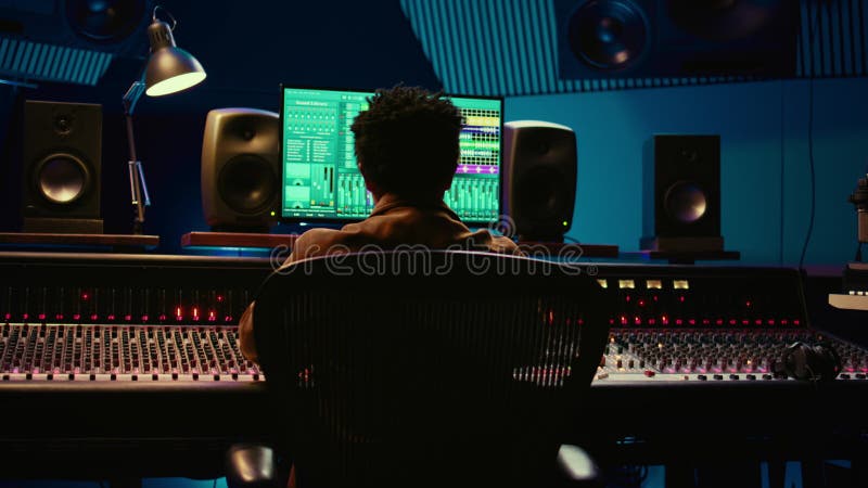 African American Sound Designer Mixing and Mastering Tracks in Studio ... African American Sound Designer Mixing and Mastering Tracks in Studio ...