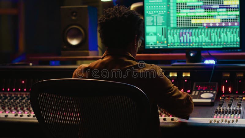 African American Sound Designer Mixing and Mastering Tracks in Studio ... African American Sound Designer Mixing and Mastering Tracks in Studio ...