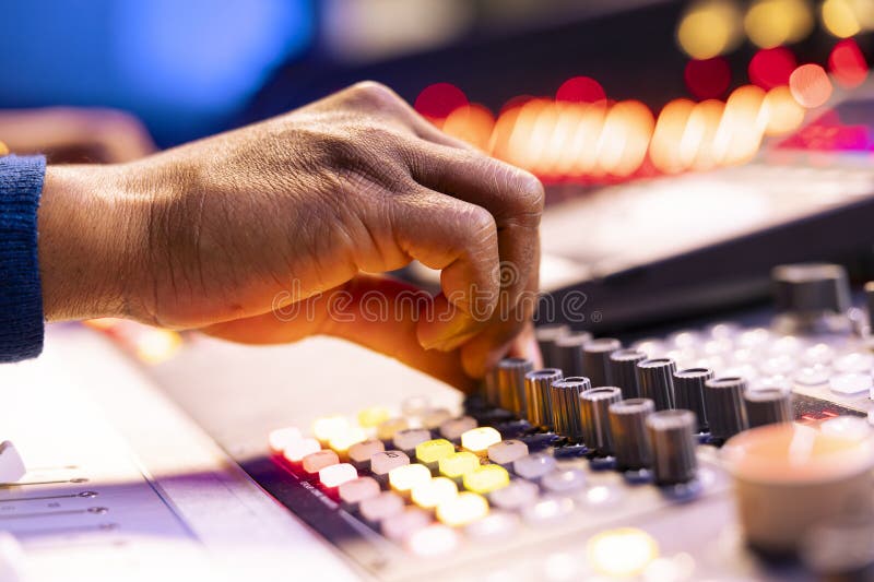 African American Sound Engineer Operates Audio Console in Control Room ...