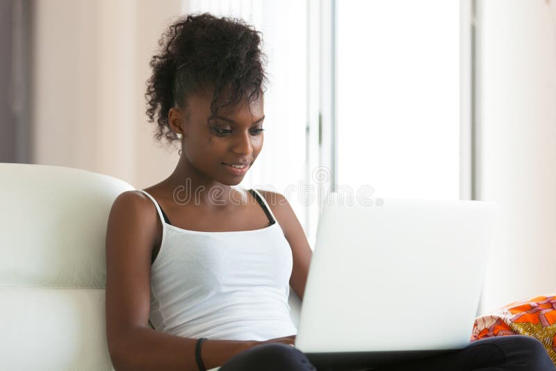 African American Student Girl Using a Laptop Computer - Black Pe Stock ...