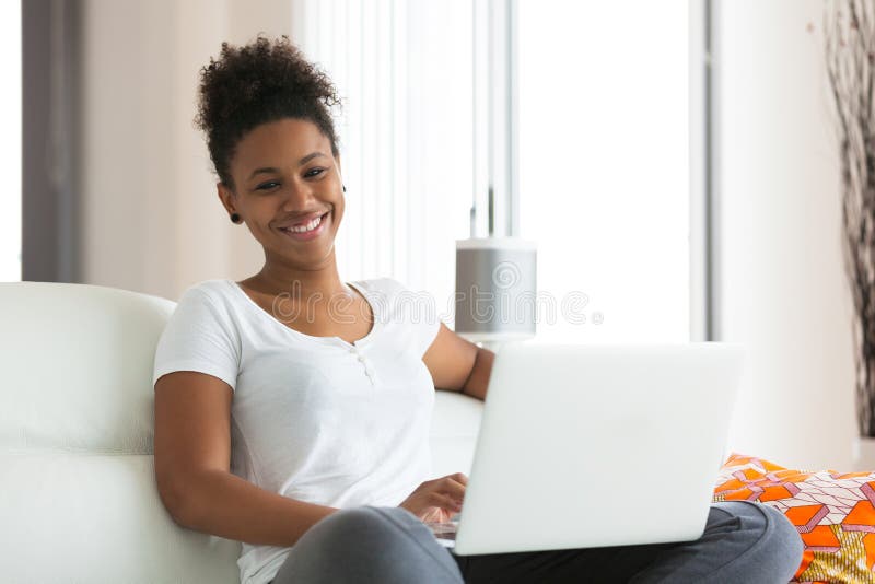 African American Student Girl Using a Laptop Computer - Black Pe Stock ...