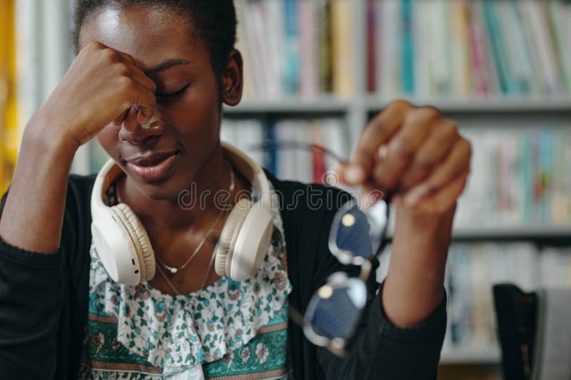 Student Tired of Study in the Library Stock Image - Image of glasses ...