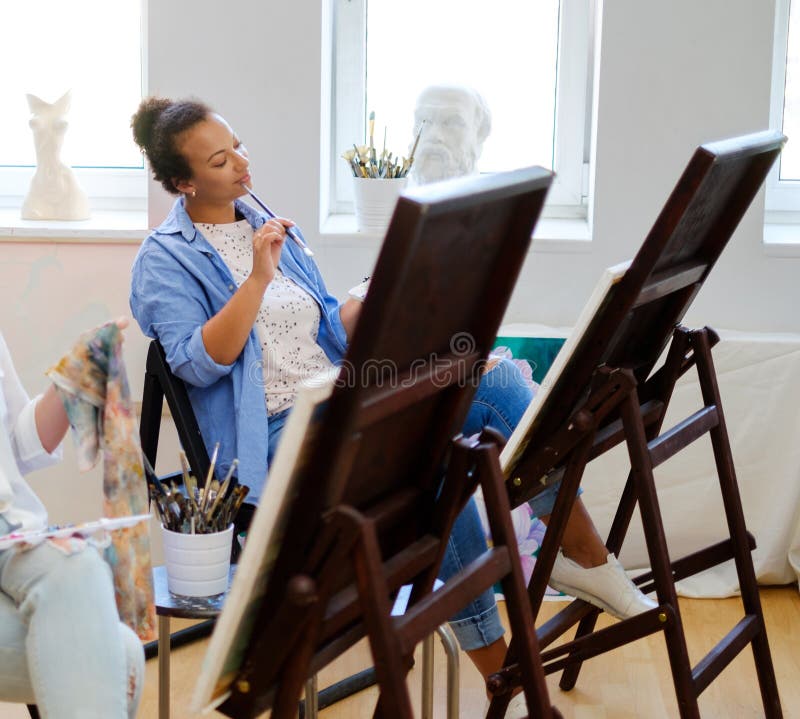 African American Student Working in a Painting Studio Stock Photo ...